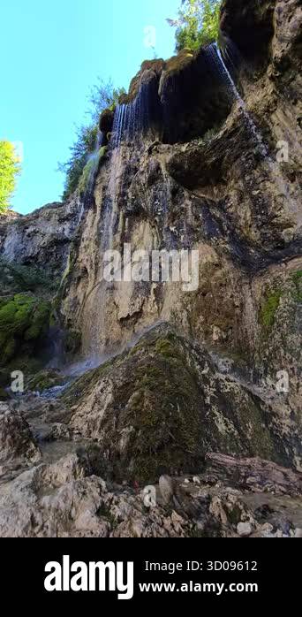 Beautiful slow motion video of green moss travertine waterfall Cascada ...
