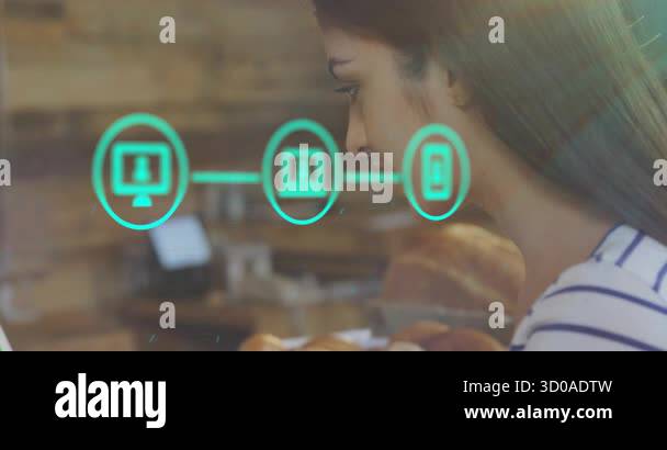 Woman at counter with basket lifting laptop after animated tech icons ...