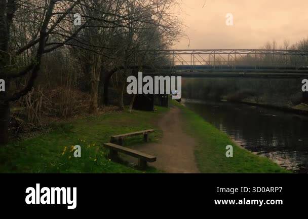 Canal bridge over waterway landscape in Yorkshire wide 4k drone aerial ...