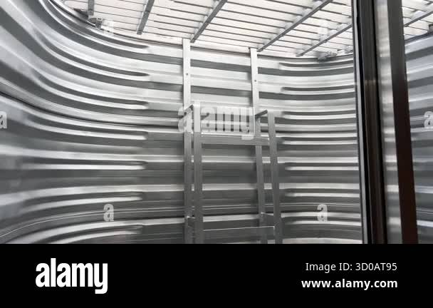 View from inside a window well showing its protective steel grate and ...