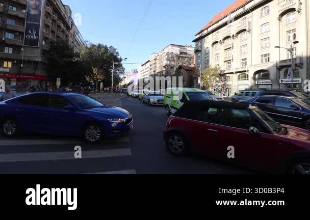 Car traffic at rush hour in downtown area of the city. Car pollution ...