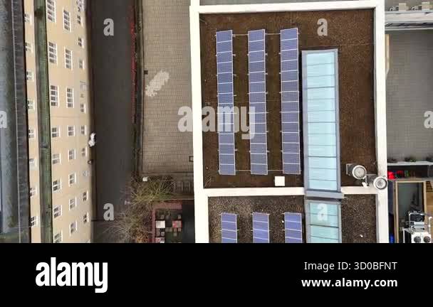 Aerial view of modern architecture with solar panels and inner ...