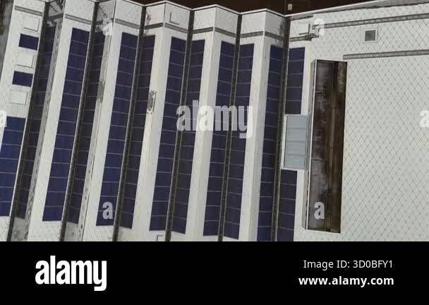 Close-up aerial view of solar panel rooftop showing textures and ...