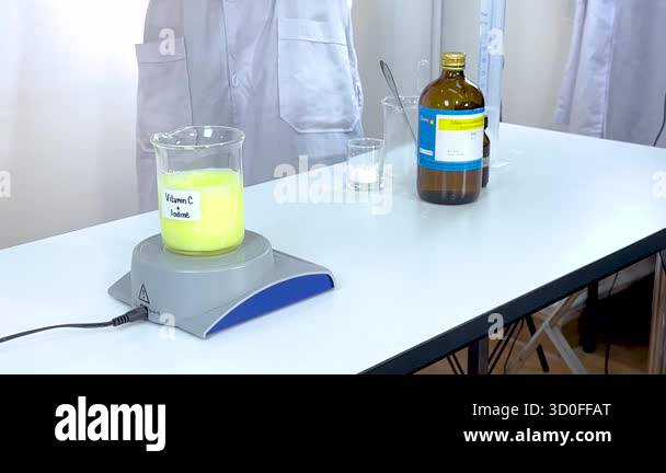A science experiment demonstrating the iodine clock reaction with ...