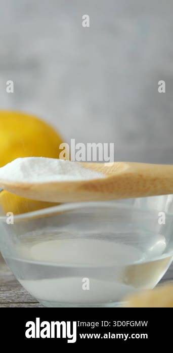 baking soda powder pouring in a bowl of water Stock Video Footage - Alamy