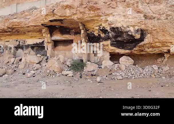 Mountain house carved into solid rock in Aleppo, Syria, damaged by war ...