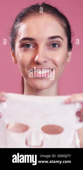 Woman smiles wearing facial mask Stock Videos & Footage - HD and 4K ...