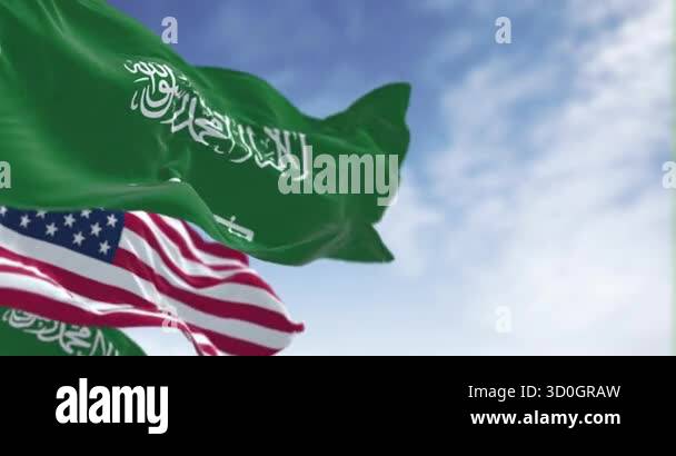 Saudi Arabia and United States flags waving. Symbol of international ...