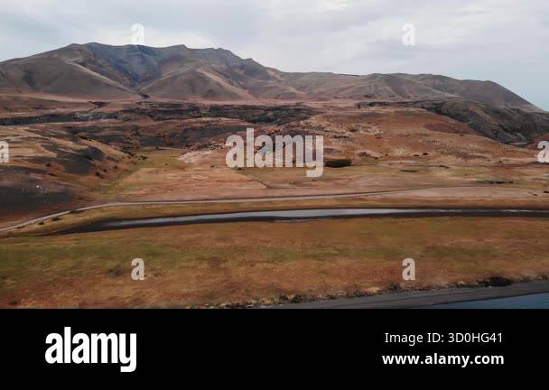 Aerial view of the rugged, arid mountains and plains of patagonia in ...
