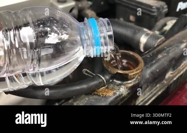 Pouring radiator repair liquid Stock Videos & Footage - HD and 4K Video ...