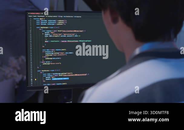 One young male Asian IT freelancer programmer and tech engineer working ...