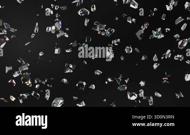 Small crystal shards are scattered on a black background, reflecting ...