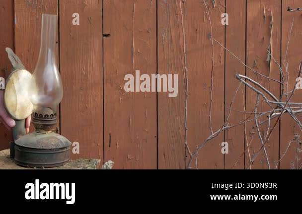 Vintage old gas lamp on wooden background Stock Video Footage - Alamy