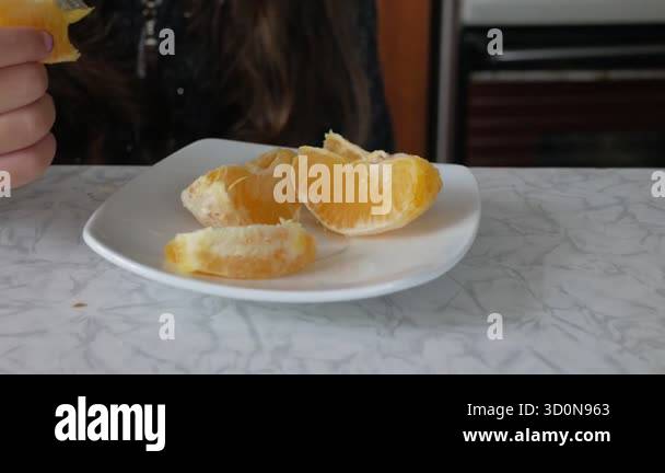 Girl eating orange slices Stock Videos & Footage - HD and 4K Video ...