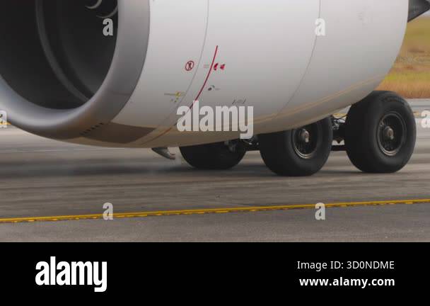 PHUKET, THAILAND - FEBRUARY 14, 2025: Close-up footage of a modern jet ...
