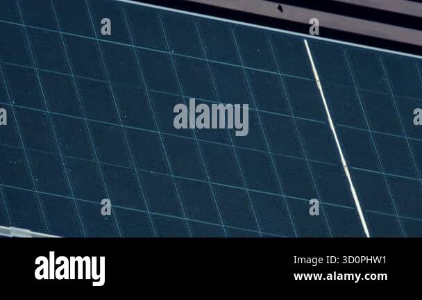 Aerial view of solar panels and rooftop patterns in the sunlight Stock ...