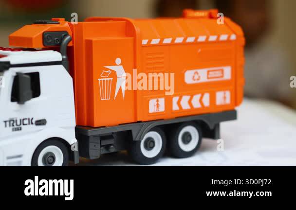 Toy garbage truck, a symbol for learning about waste collection and ...