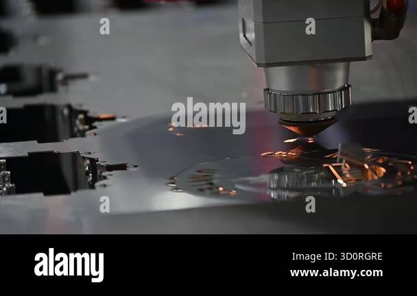 Slow motion scene the fiber laser cutting machine cut the metal plate ...