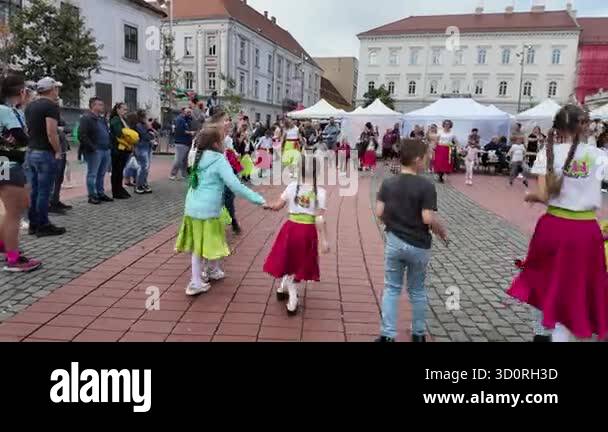 Timisoara, Romania, September 27, 2025, Kids dance in circle and play ...