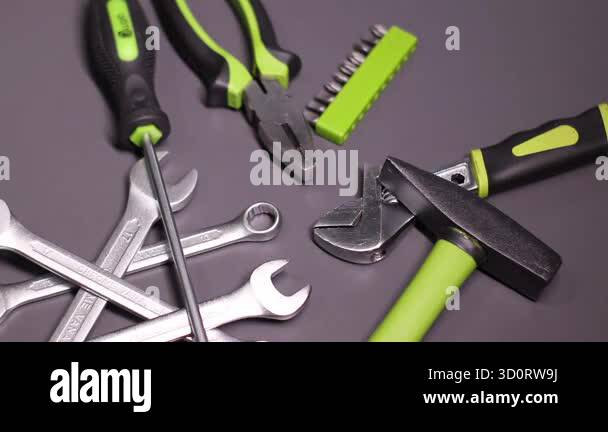 A set of building tools and instruments for repair in black and green ...