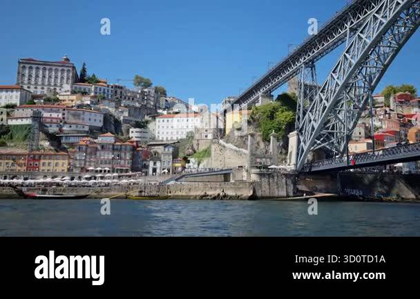 Porto, Portugal - 11 August, 2023: People crossing the Dom Luis bridge ...