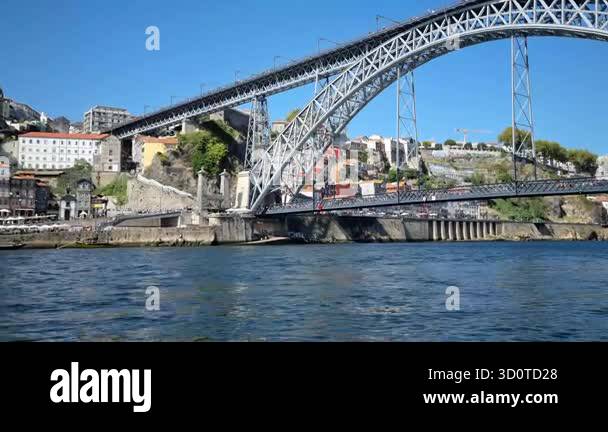Porto, Portugal - 11 August, 2023: People crossing the Dom Luis bridge ...