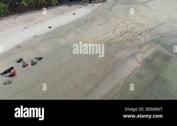 Aerial footage captures a serene beach in Phuket, Thailand ...