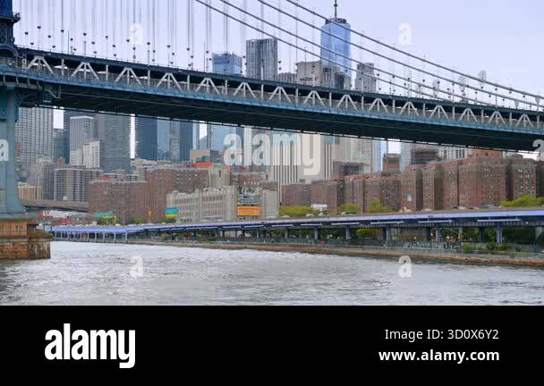 New York, USA, 16 July 2025: Manhattan Bridge over East River with New ...