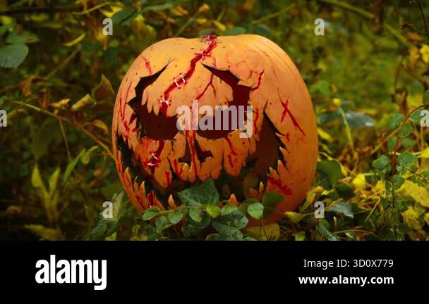 Demonic pumpkin bleeding with cursed grin among haunted forest shadows ...