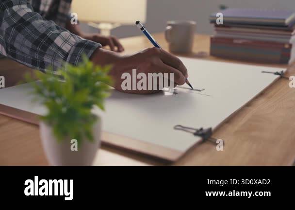 Close up mans hands drawing with pencil on paper Stock Video Footage ...