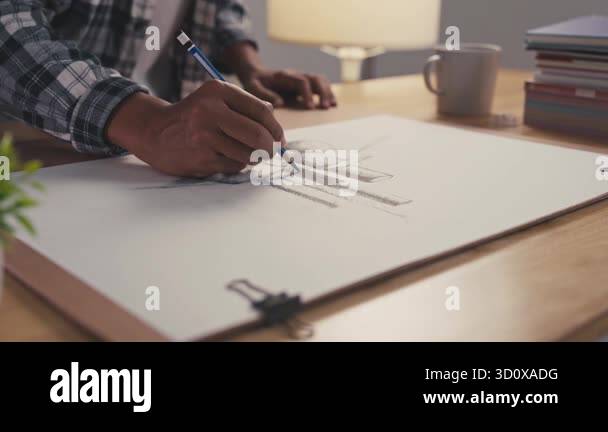 Close up mans hands drawing with pencil on paper Stock Video Footage ...