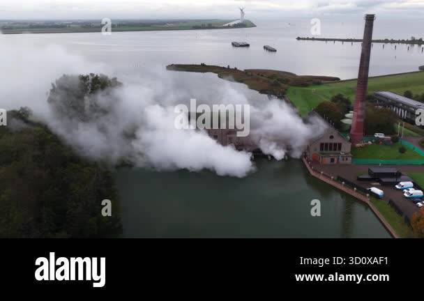 Steam rising up from the old Woudagemaal steam pumping station in ...