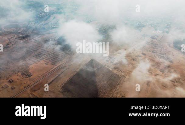 Aerial view of the Egyptian Pyramids in Giza as clouds move overhead ...
