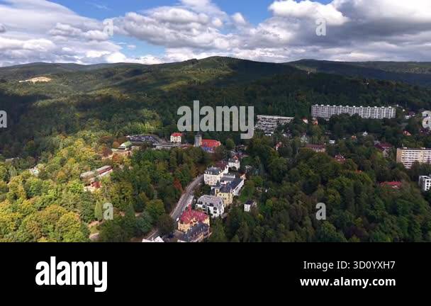 The stunning aerial view reveals a vibrant town that is elegantly ...