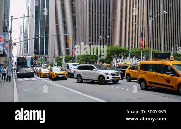 New York, USA, 1 August 2025: Traffic with buses and taxis in New York ...