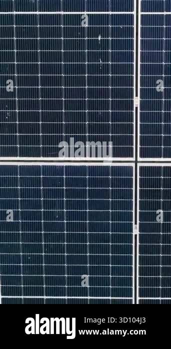 An overhead view of solar panels on a roof, showcasing renewable energy ...