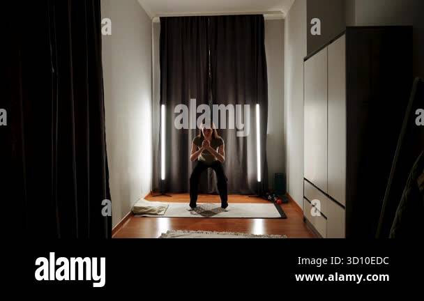 Fitness training session in a cozy room with focused lighting and ...