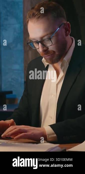 Caucasian business man typing computer at night confused spreading ...