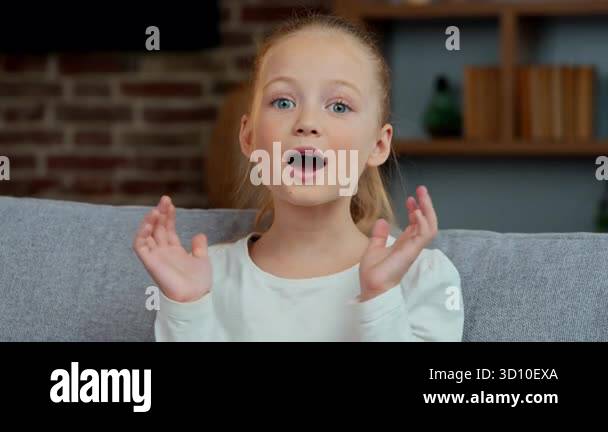 Portrait Caucasian little child girl kid daughter amazed open mouth ...