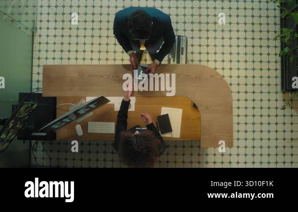 Top view concierge receptionist meeting passenger man airport ...