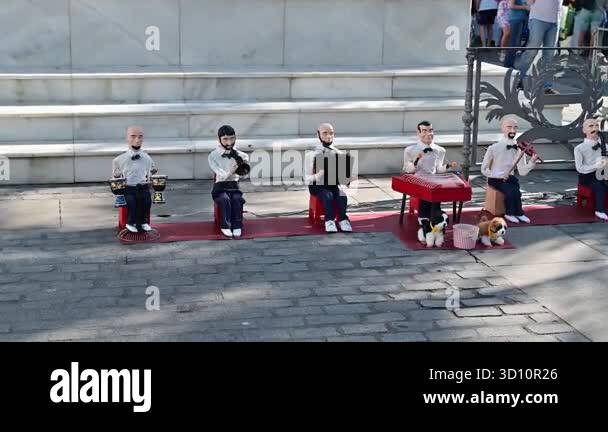 Puppet concert with musical instruments in Cadiz, Spain Street art and ...