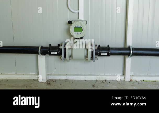 Detailed view of sewage purification system with pipes and flow meter ...