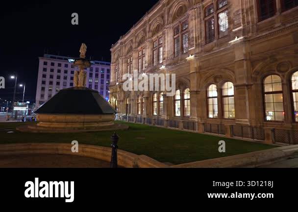 Panoramic night view of Vienna State Opera and square during Christmas ...