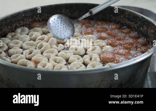 Traditional Turkish dessert. It is called "Lokma". Delicious and ...