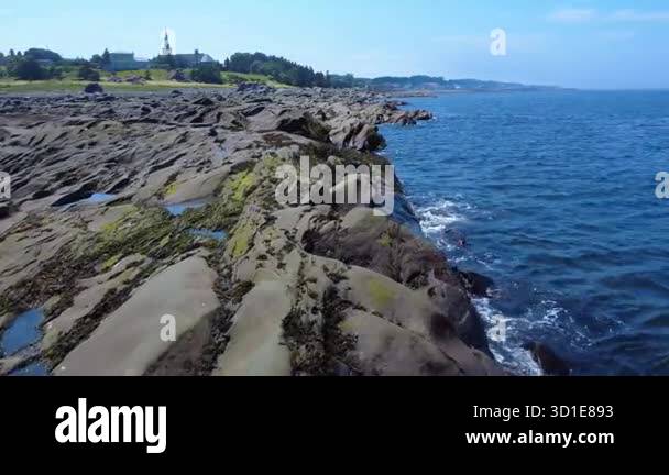 The rocky shore of the St. Lawrence River, formed of sedimentary rocks ...