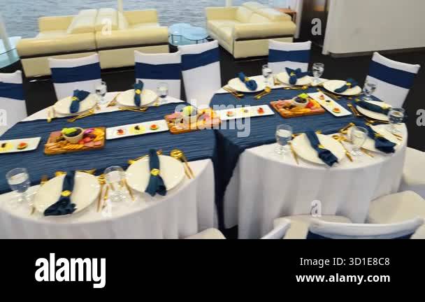 Luxury dinner setup on a yacht in New York. Elegant table setup for a ...