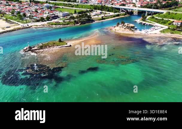 Drone view of Nea Potidea Canal connecting the Toroneos and Thermaic ...