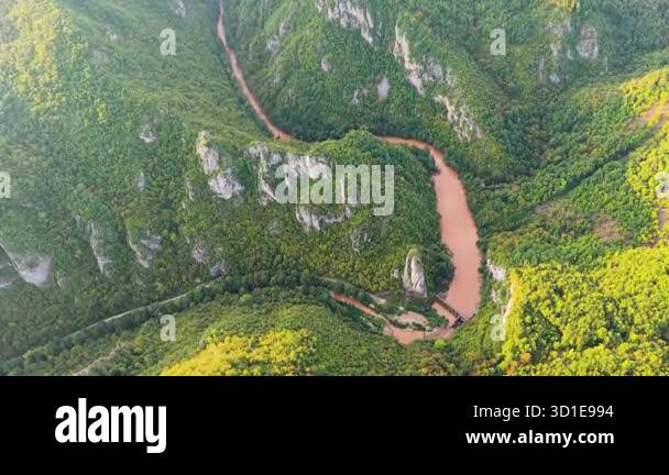 Vertical drone footage reveals winding Praca canyon river meanders ...