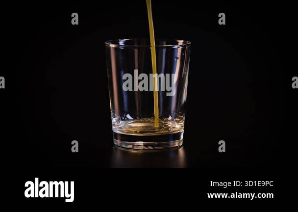 Orange juice being poured into a glass Stock Video Footage - Alamy