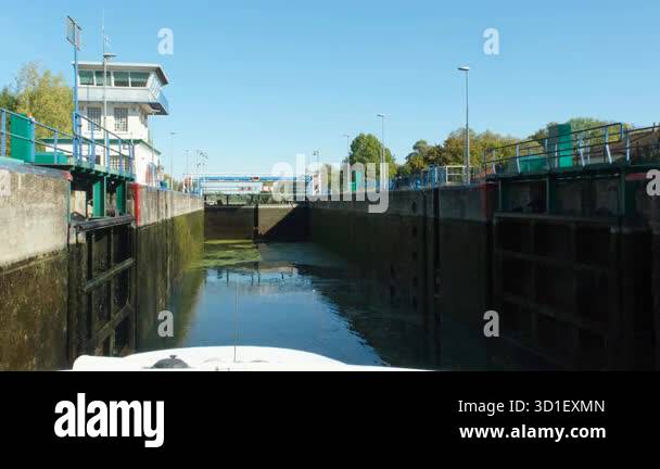 Lock 6 Pont Malin on Escaut canal with concrete walls, blue railing ...